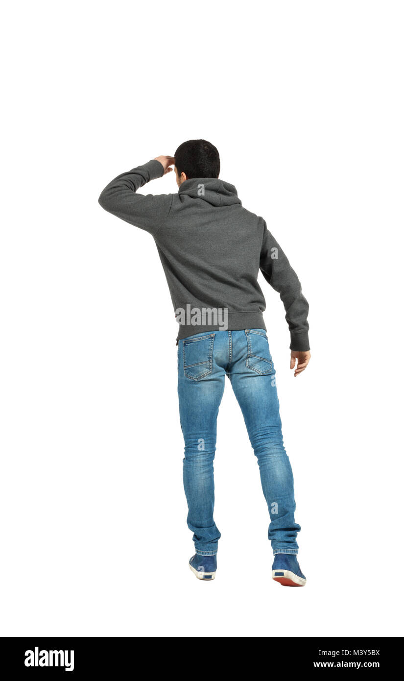 Portrait of the young man isolated on a white background, back view ...