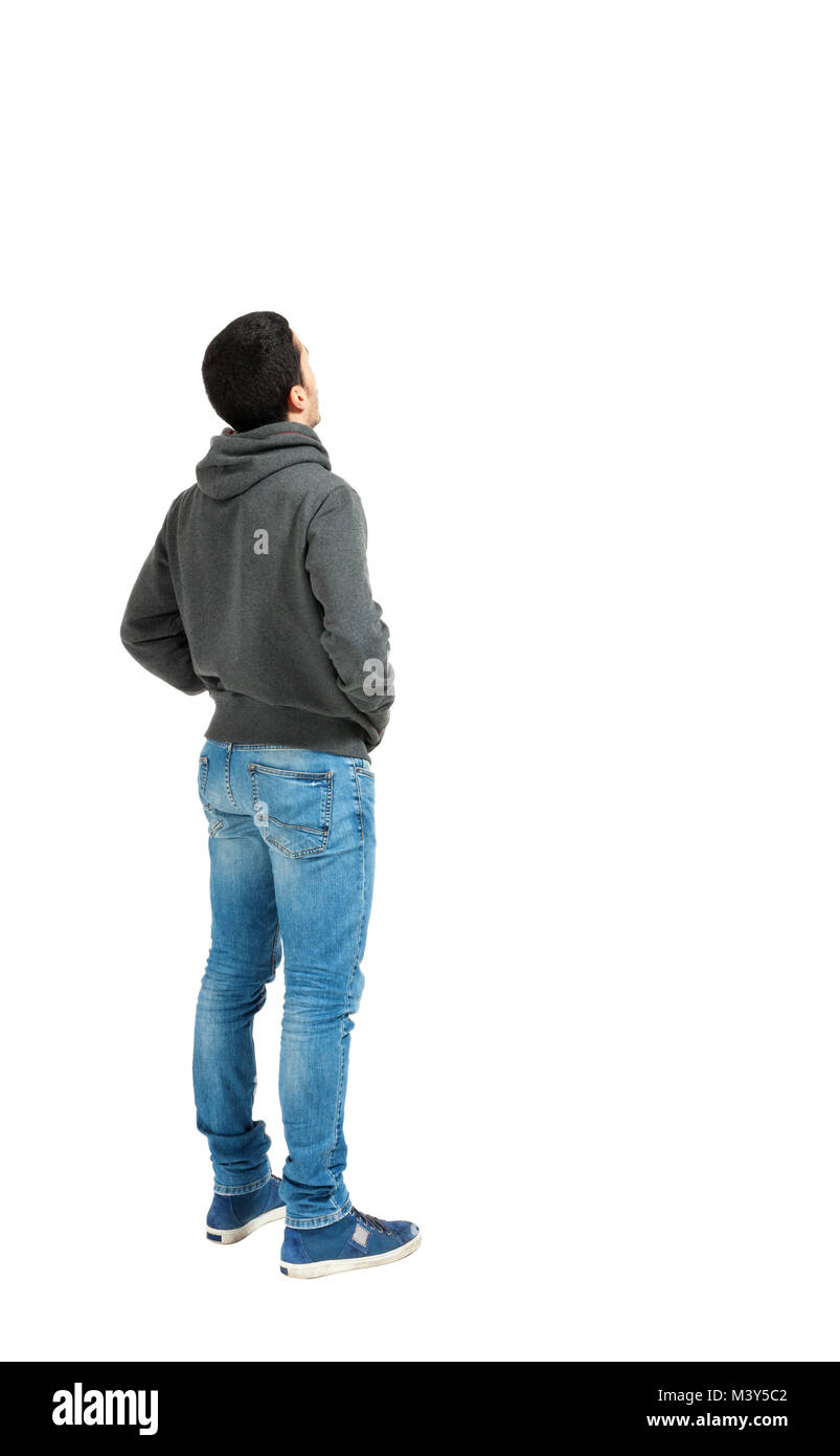 Portrait of the young man isolated on a white background, back view ...