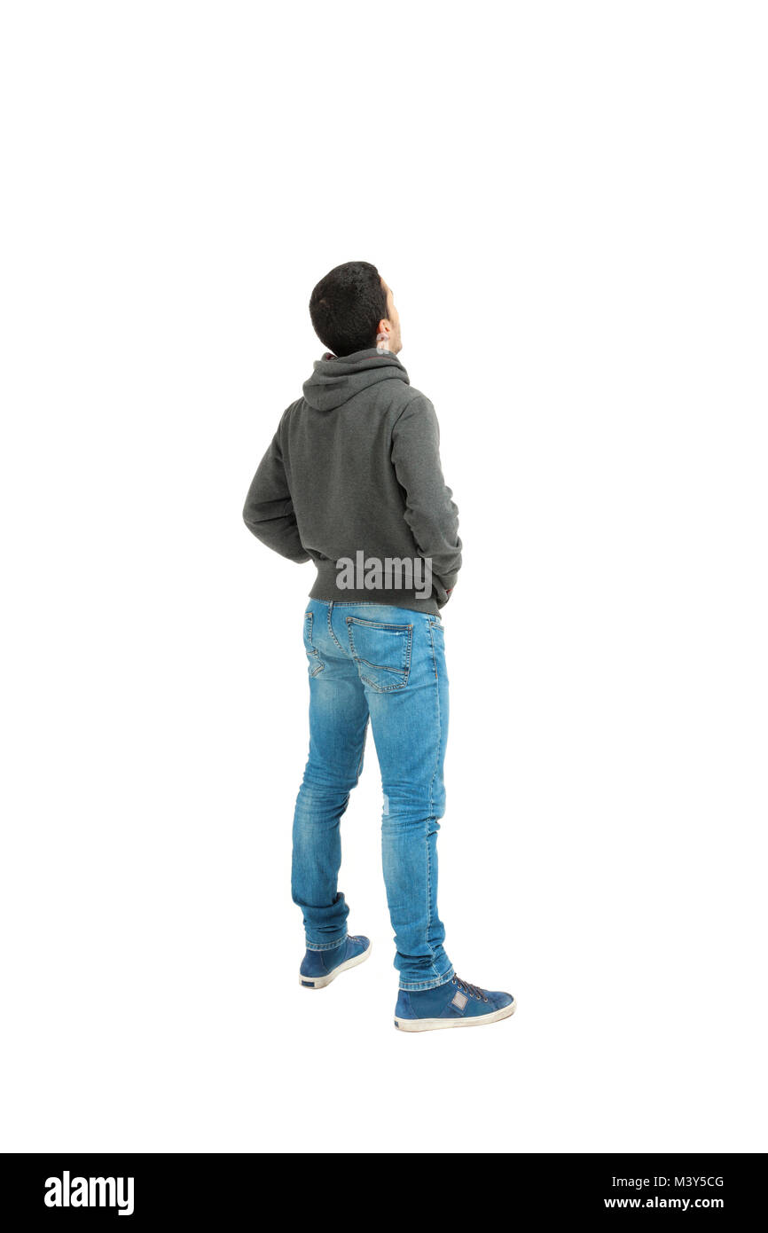 Portrait of the young man isolated on a white background, back view ...