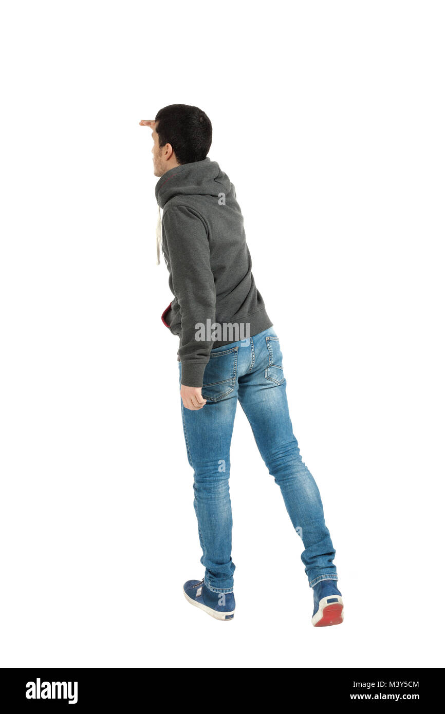 Portrait of the young man isolated on a white background, back view ...