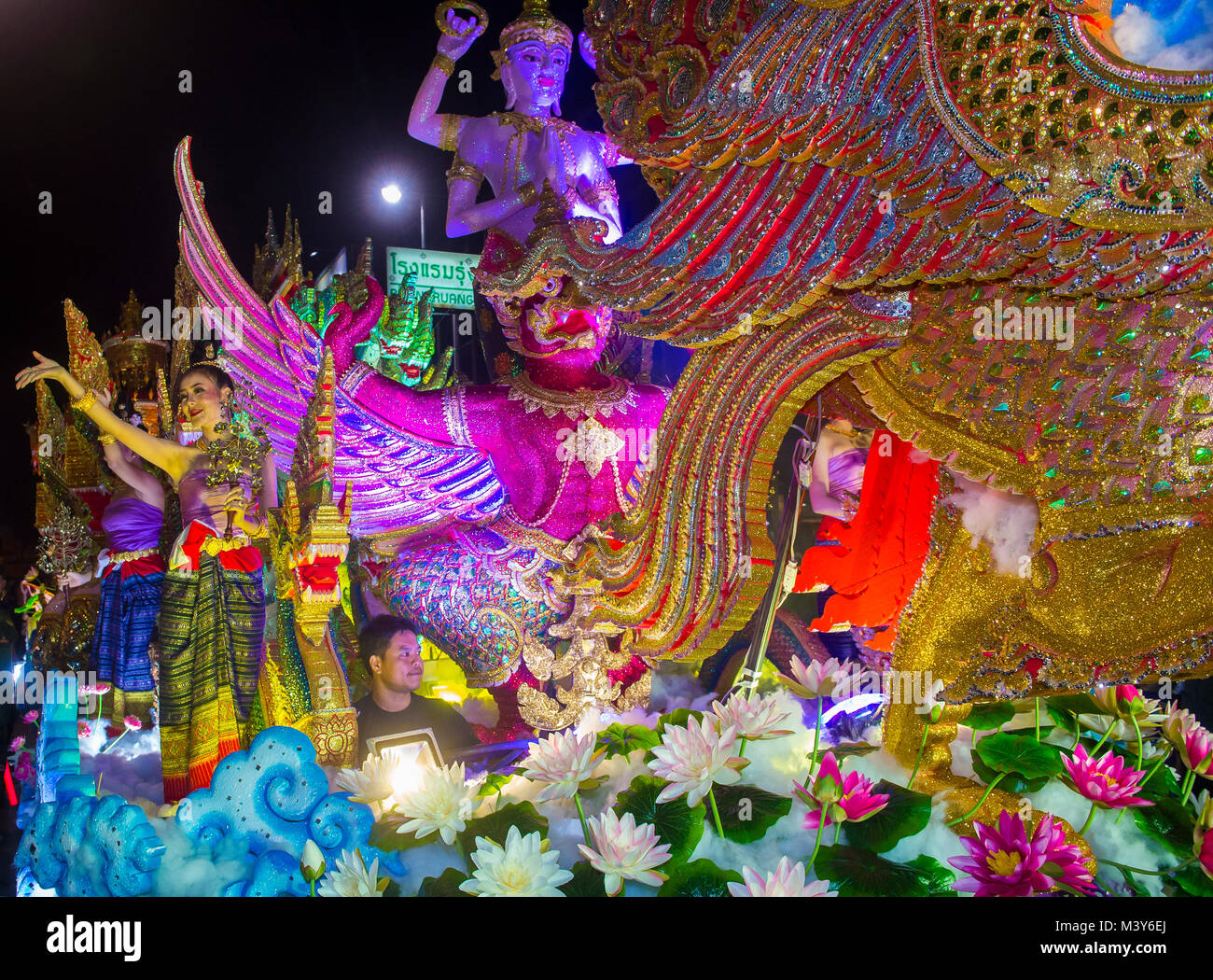Participants in a parade during Yee Peng festival in Chiang Mai ...