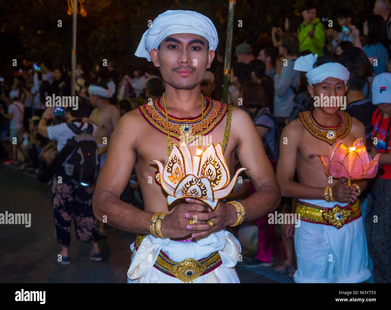 Participants in a parade during Yee Peng festival in Chiang Mai ...