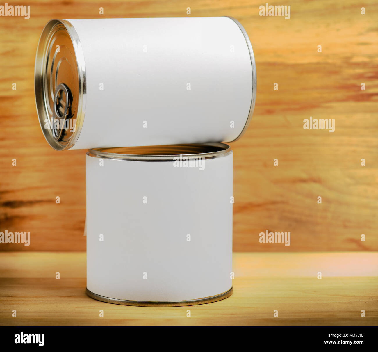 food tin cans on wood background Stock Photo - Alamy