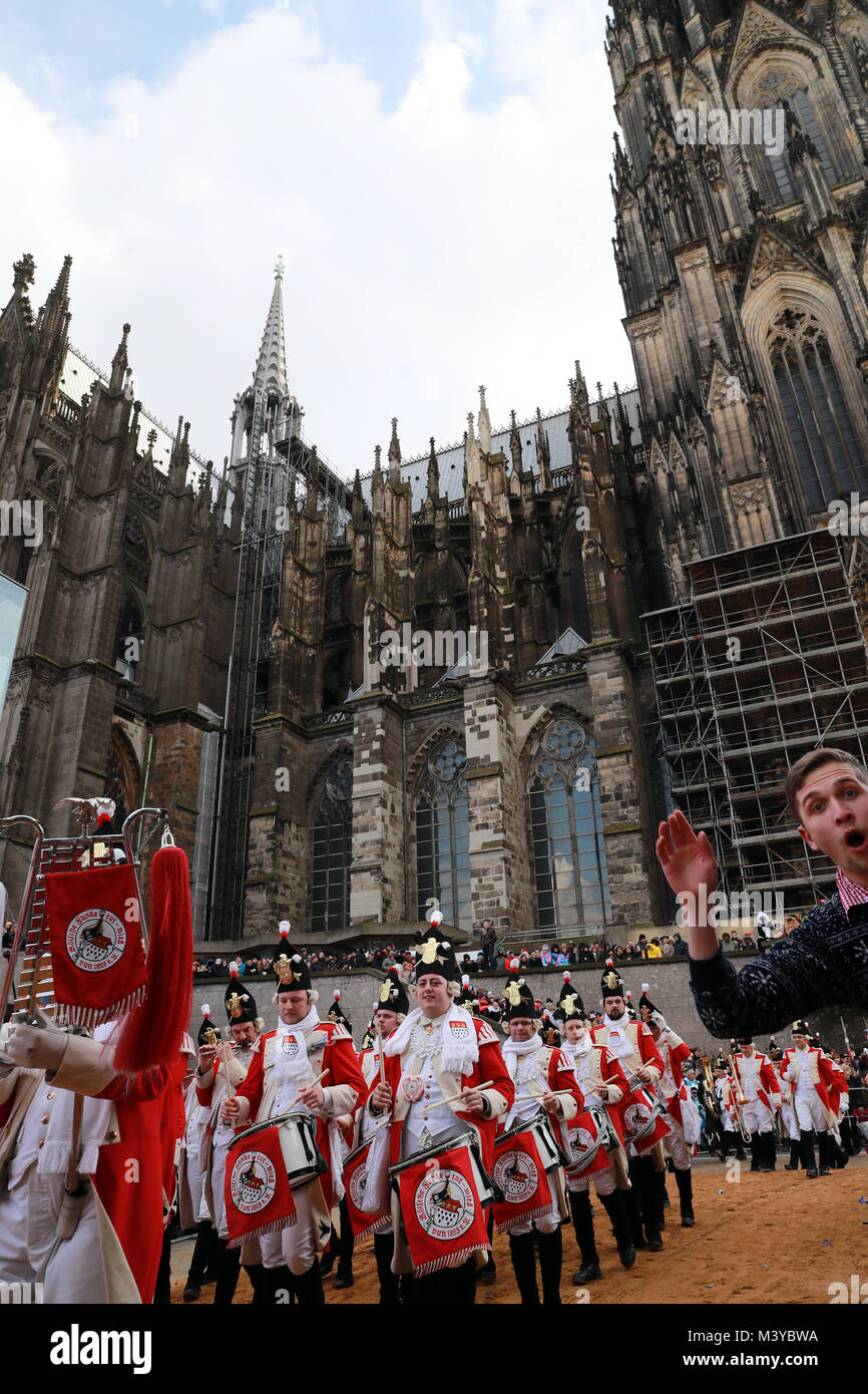Cologne, Germany. 12th Feb, 2018. Revelers attend the Rose Monday ...