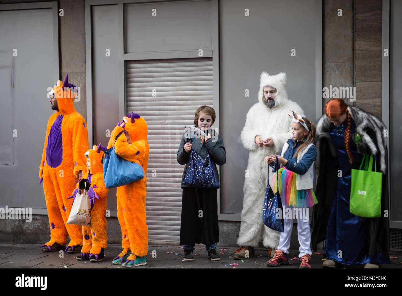 Cologne, Germany. 11th Feb, 2018. A group of people seen wearing funny ...