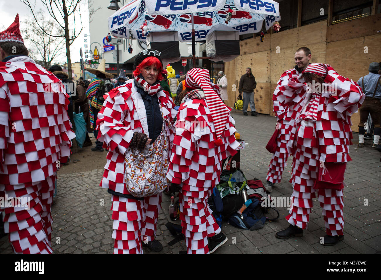Cologne, Germany. 11th Feb, 2018. A group of people seen wearing red ...