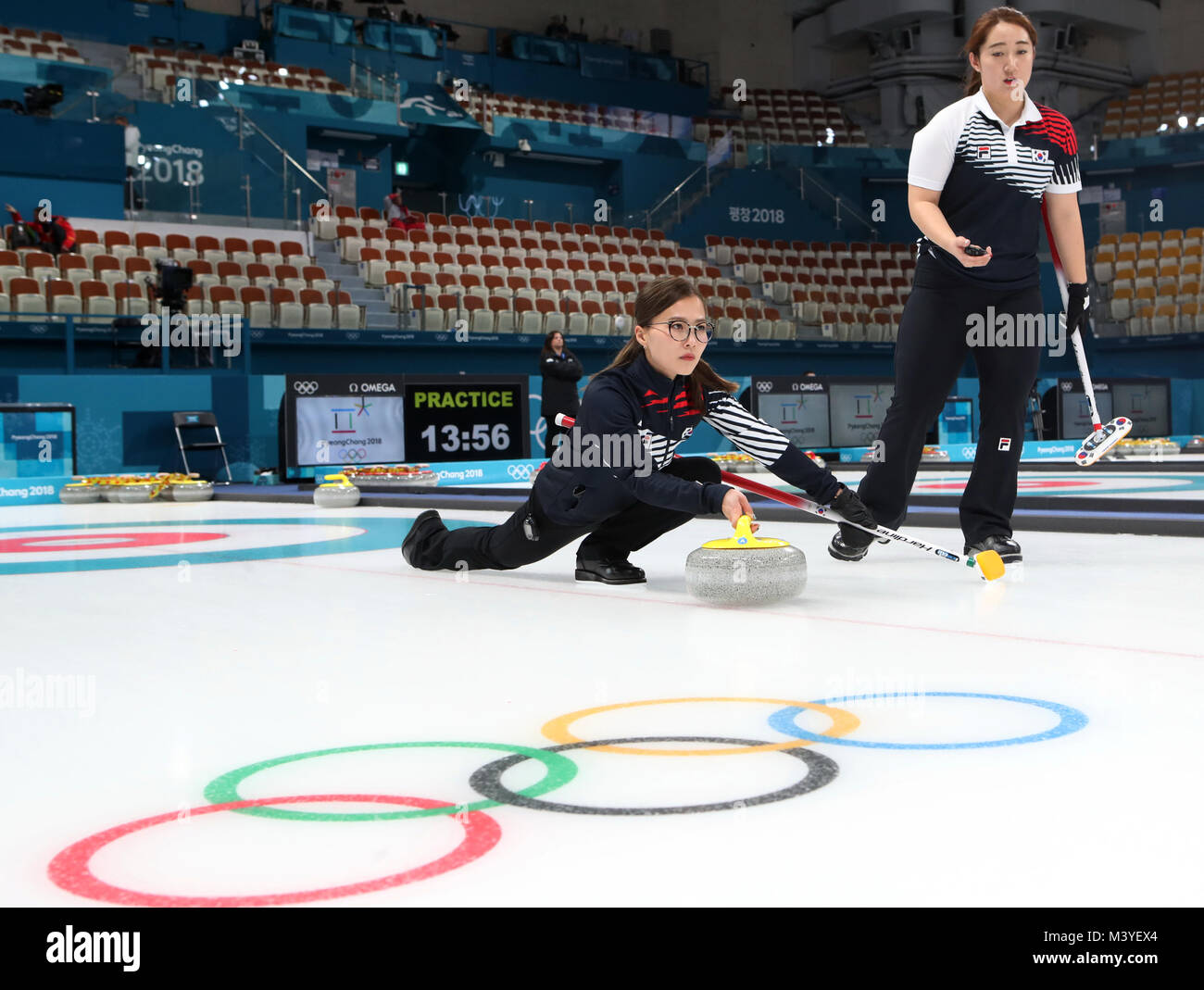 13th Feb, 2018. Curling practice Kim Eun-jong of South Korea slides a ...