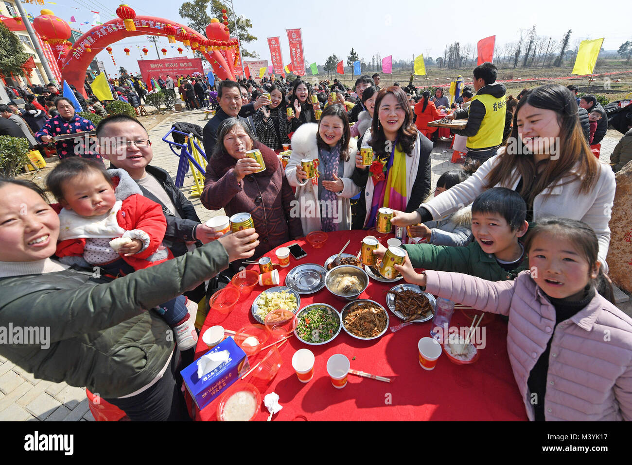 Yichun, China's Jiangxi Province. 13th Feb, 2018. Villagers gather ...