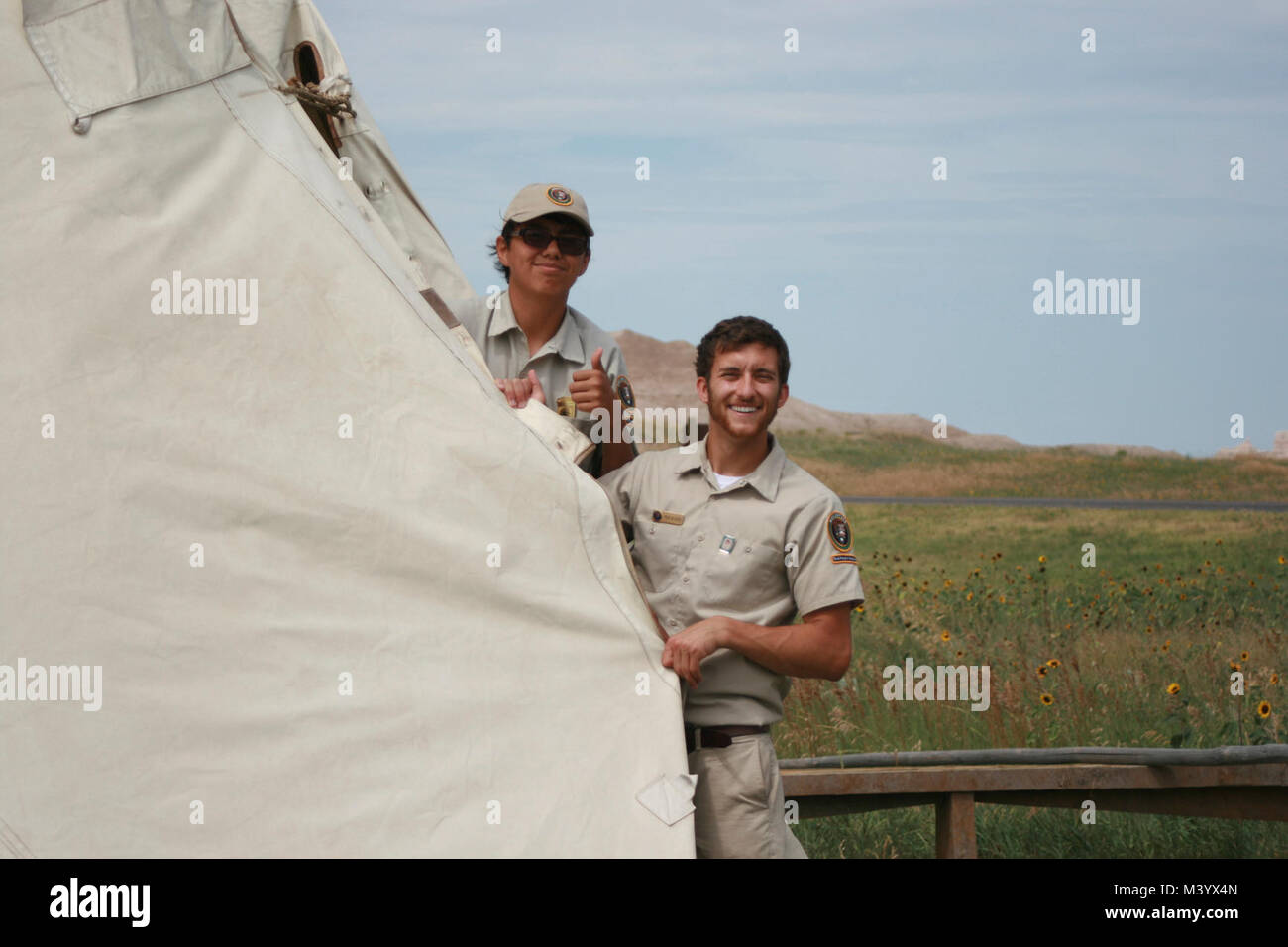 Youth Intern Joseph and partner teacher Dylan Gallacher set up a tipi ...