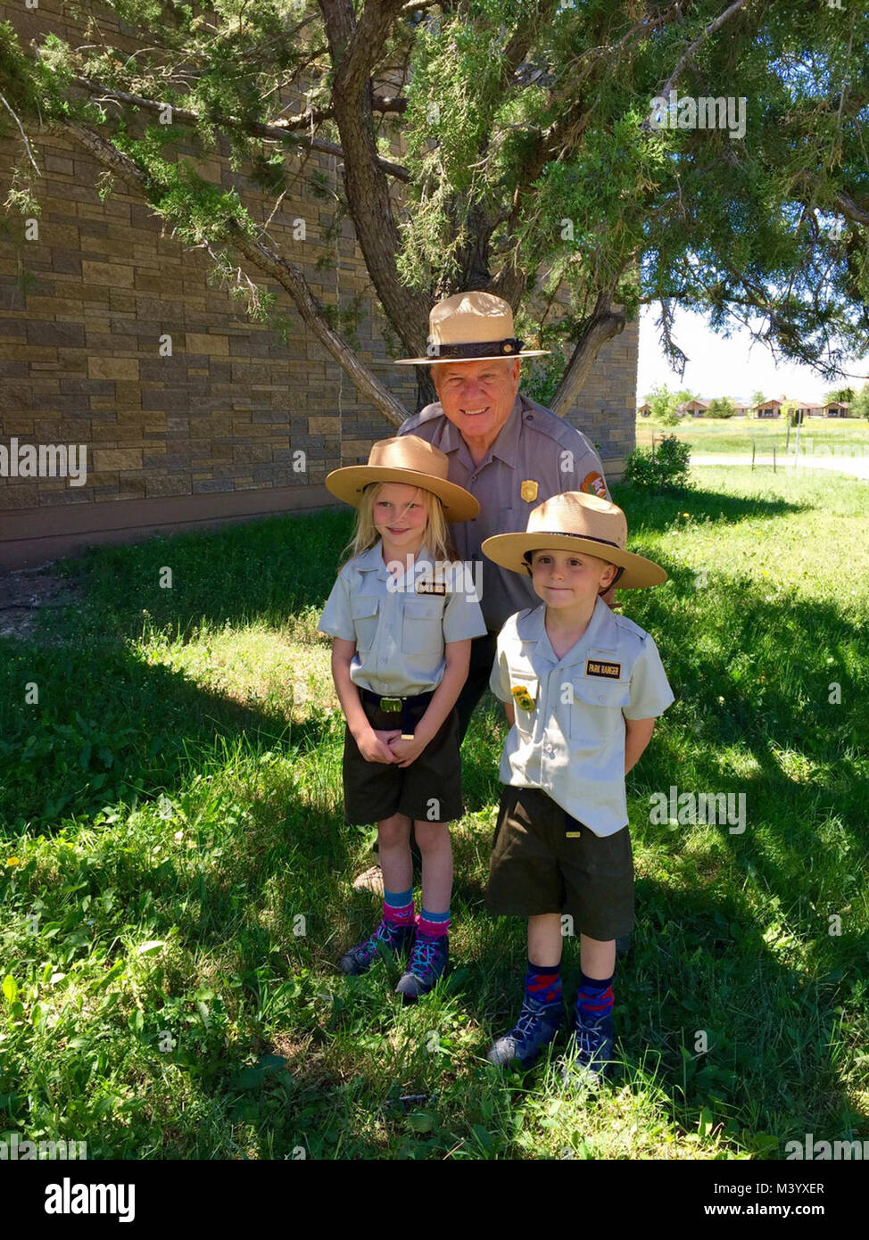 Ranger with little children Rangers Stock Photo - Alamy