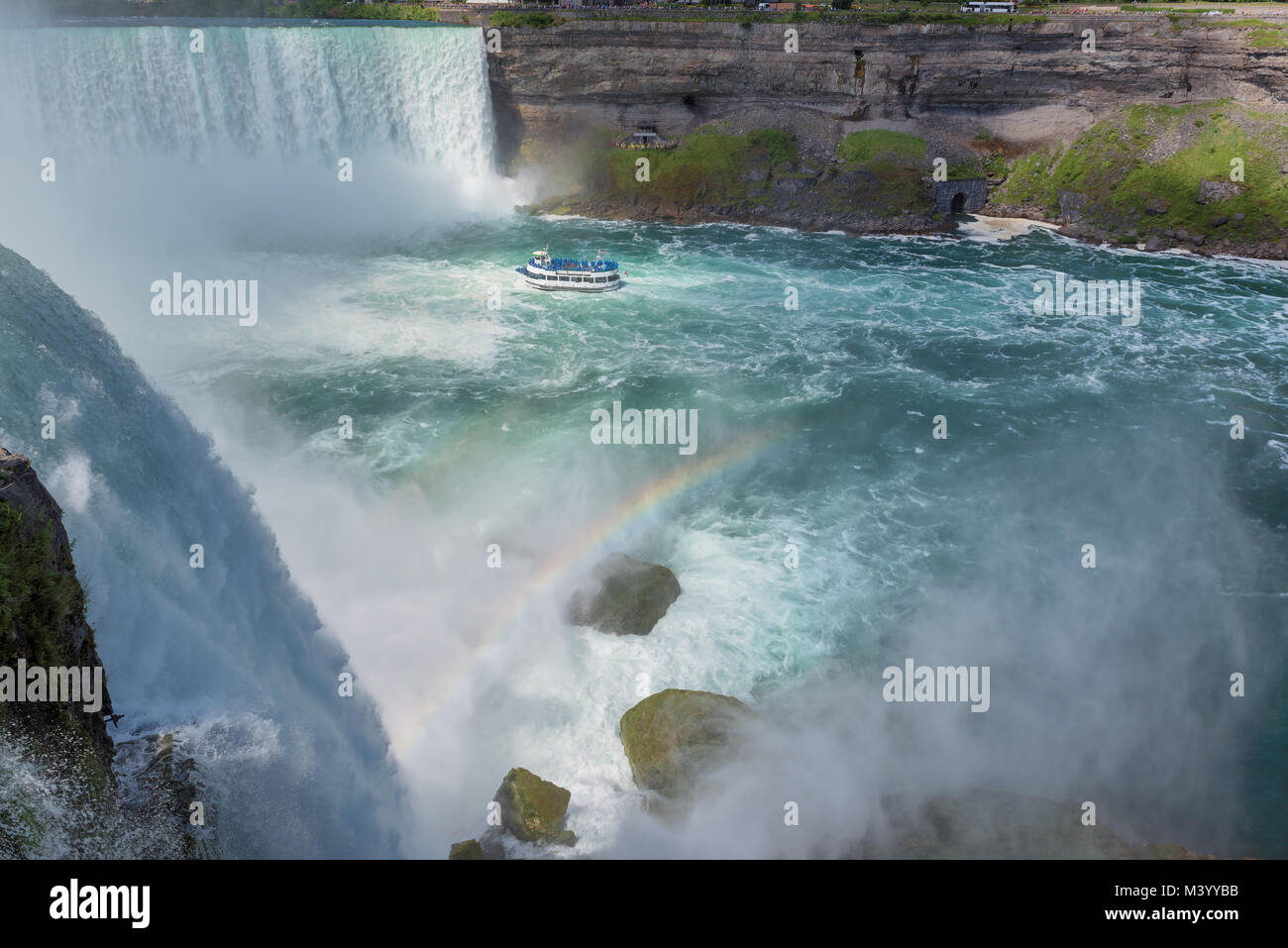 Niagara Falls, Tour Boat under Horseshoe Waterfall with Rainbow Stock ...
