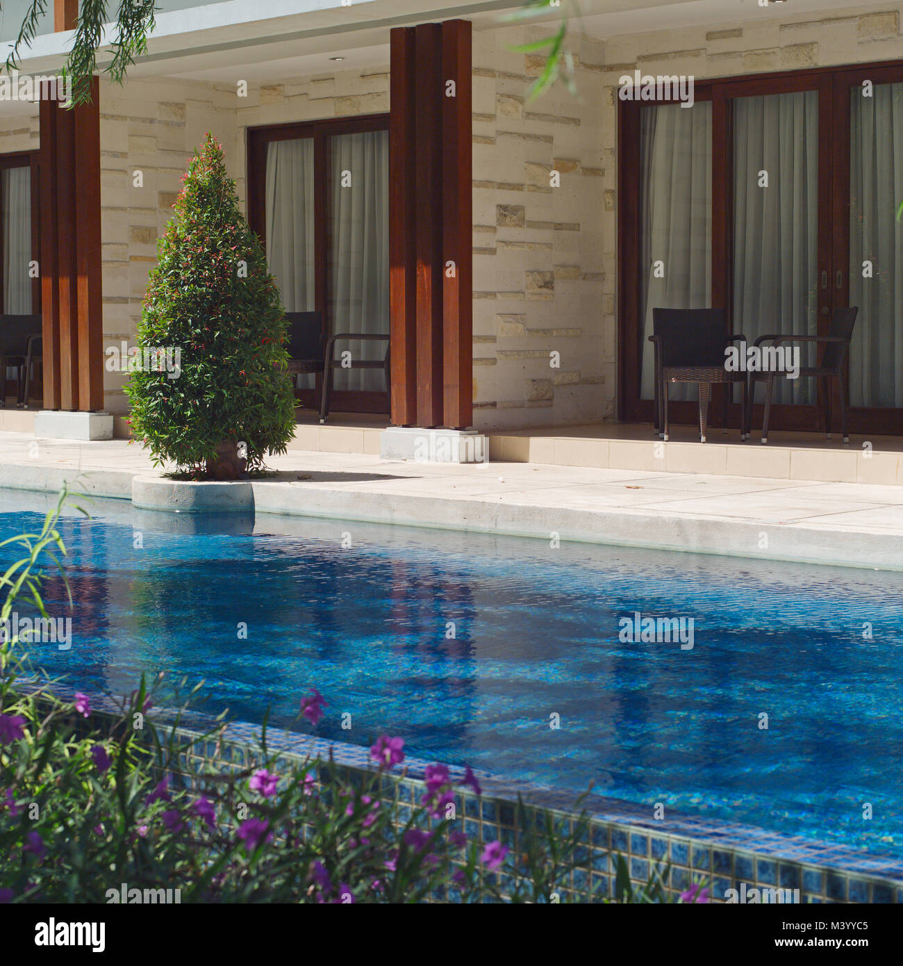 Swimming pool in luxury resort Stock Photo - Alamy