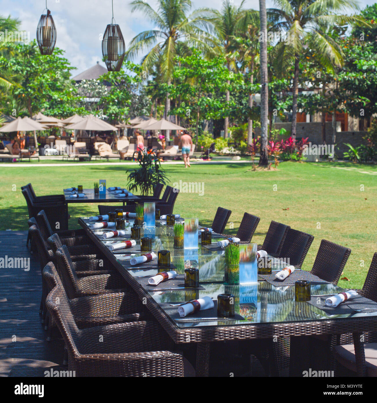 Outdoor beach restaurant at tropical resort. Bali, Indonesia Stock ...