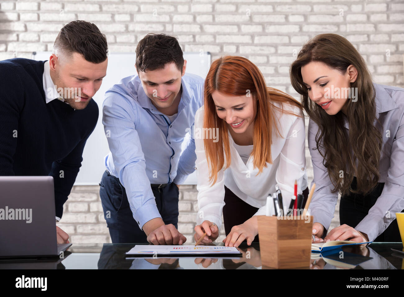 Business People At The Meeting Discuss Current Issues At The Modern ...
