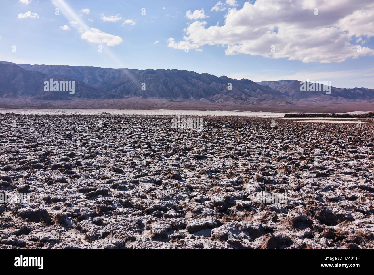 Dry arid desert terrain and mountains in the distance in the Atacama ...