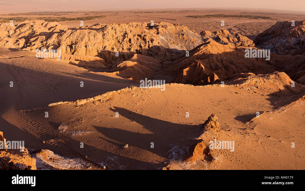 Morning sunlight glowing on the Martian-like landscape of the Atacama ...
