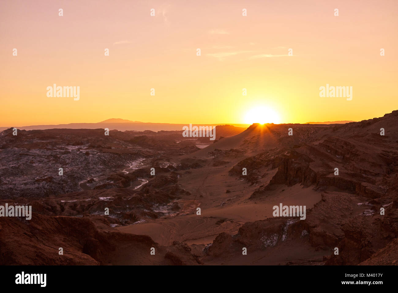 Sun setting over desert landscape hi-res stock photography and images ...