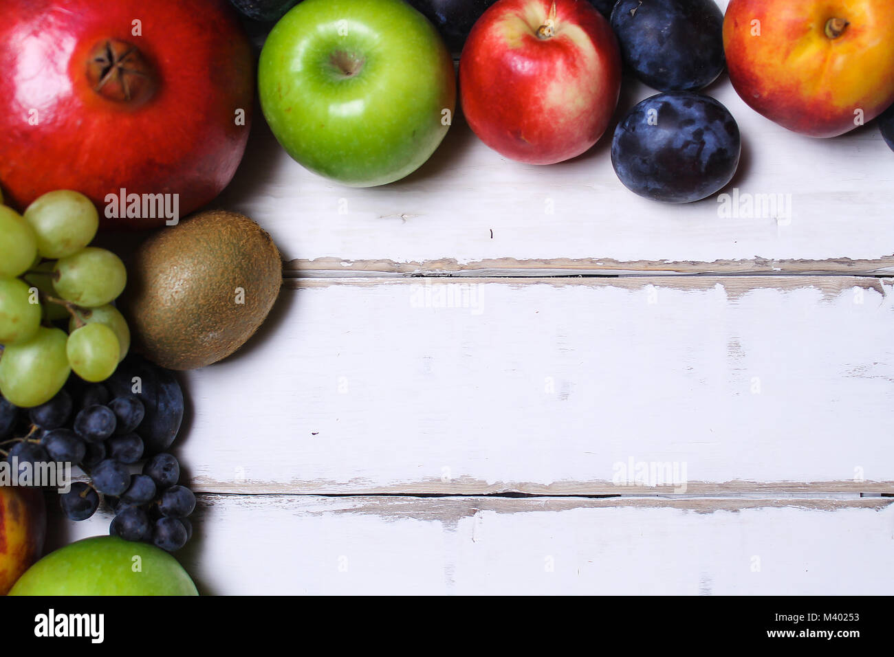 Fruits on a wooden table Stock Photo - Alamy