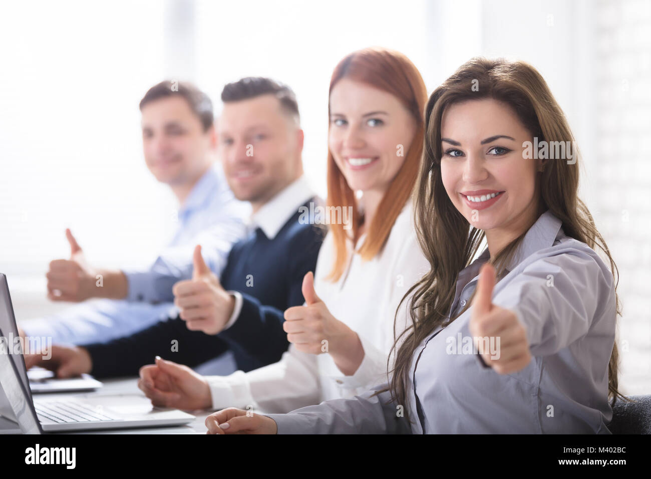 Colleagues showing team work hi-res stock photography and images - Alamy