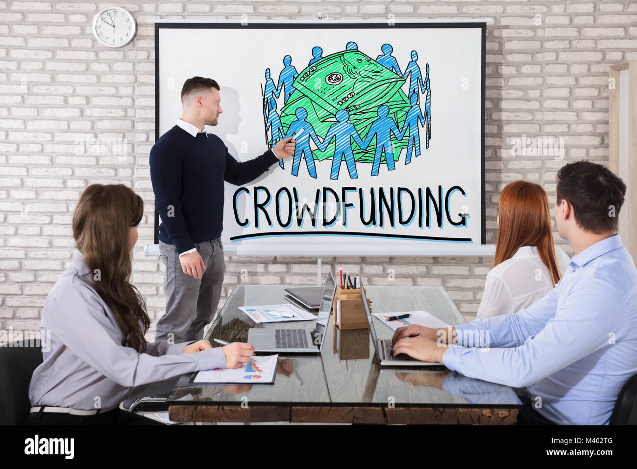 Businessman Showing Crowd Funding Concept On Whiteboard To His ...