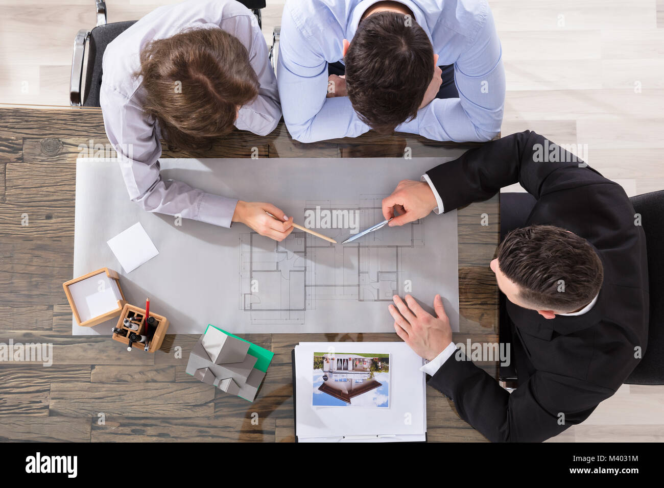Construction blueprint project working hi-res stock photography and ...