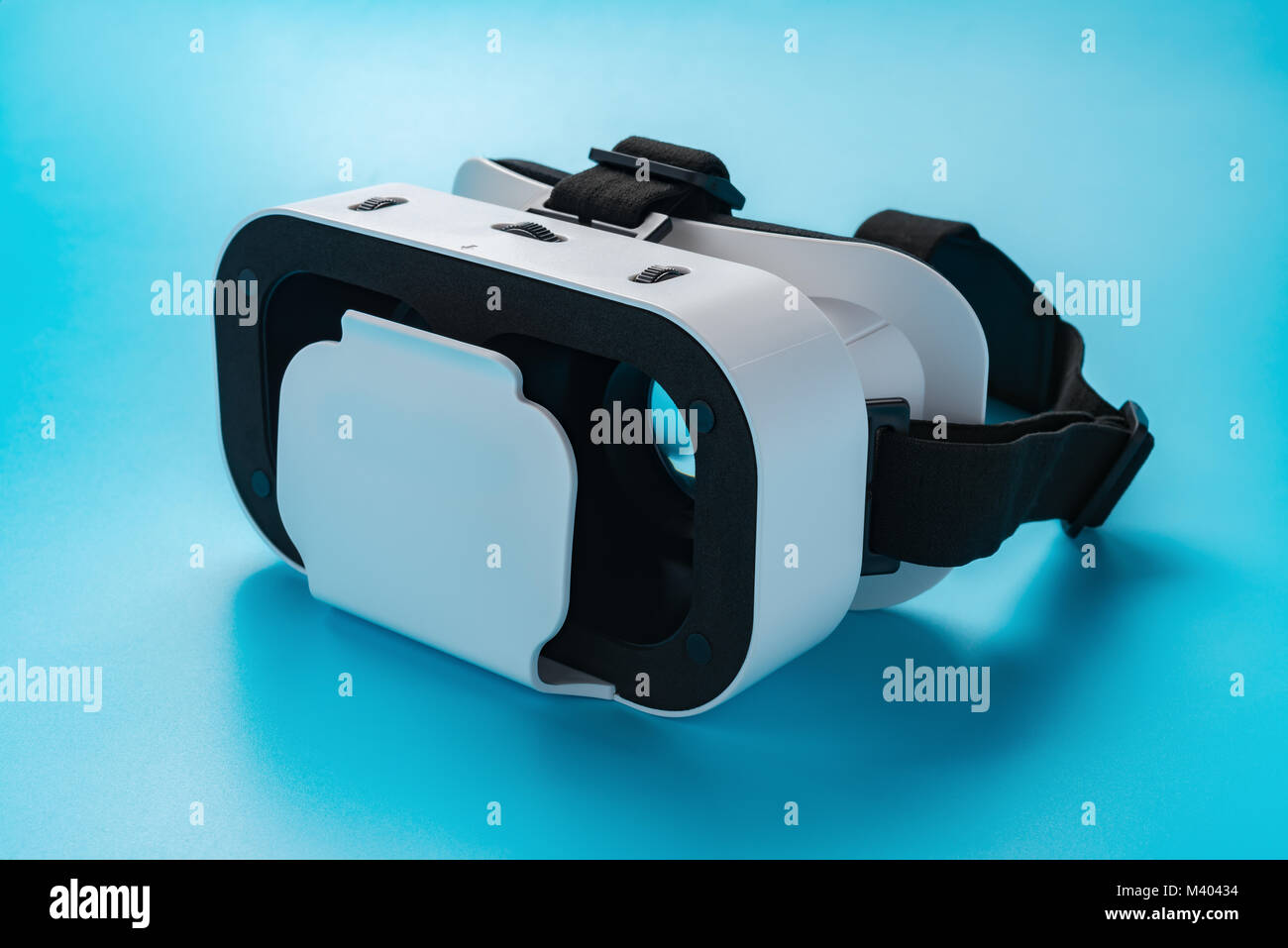 side view VR Glasses or Virtual Reality headset on a blue background ...