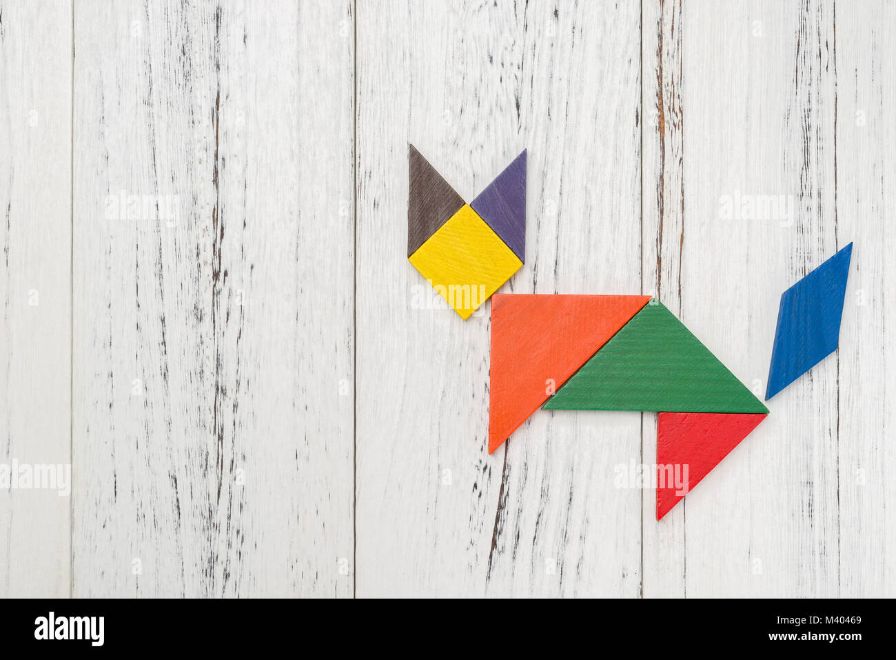 wooden tangram in a fox shape with copy space Stock Photo - Alamy