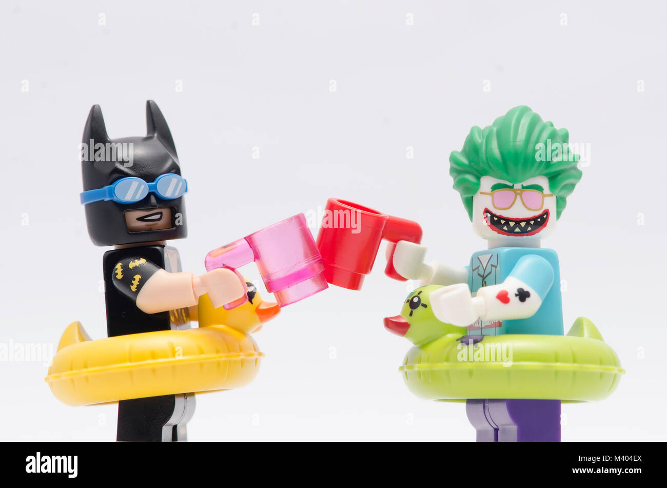 lego vacation batman and beach batman having a drink together. isolated ...