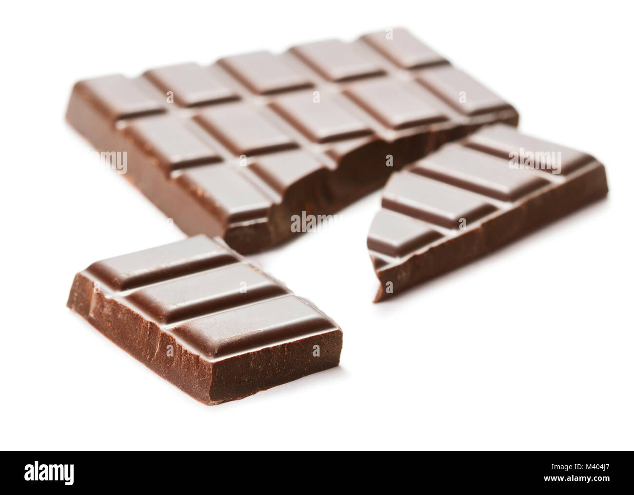 close-up view of broken chocolate bar isolated on white background ...