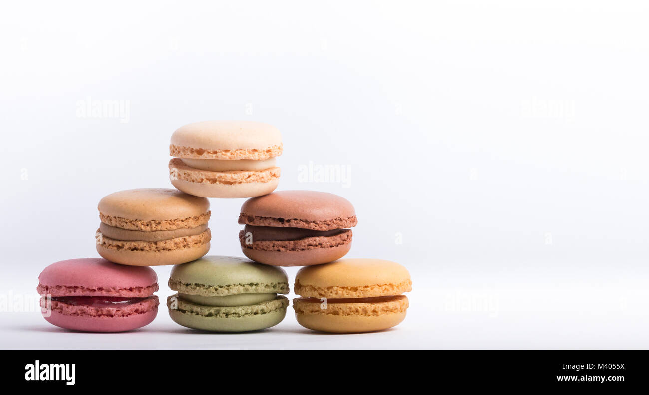 different tasteful macaroons on a white background Stock Photo - Alamy