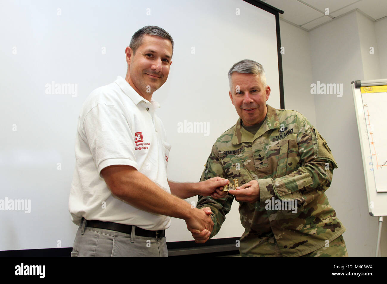 Nashville District's Craig Carrington received a commander's coin from ...