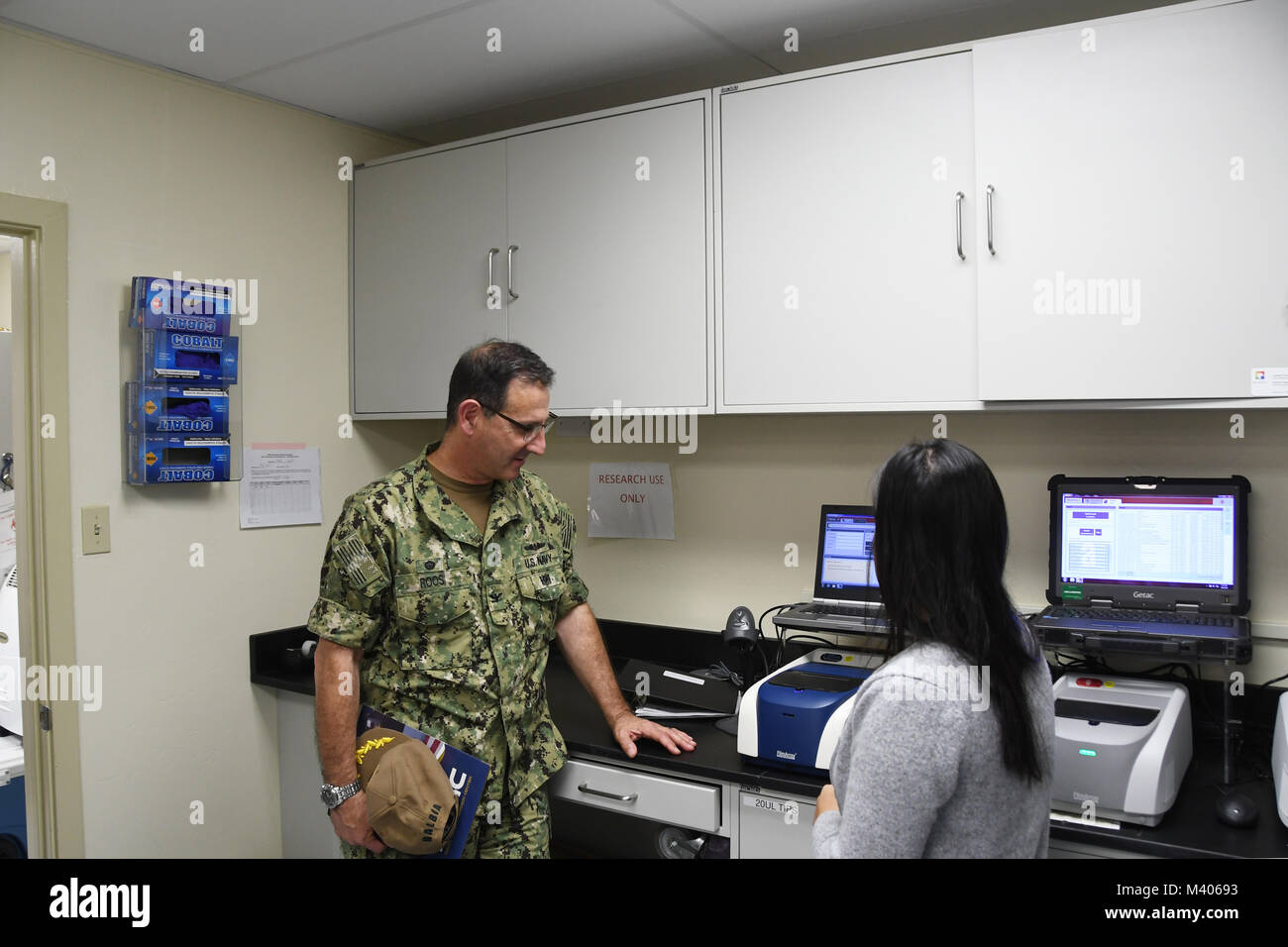 180206-N-UJ980-042 SAN DIEGO (Feb. 6, 2018) Capt. Joel Roos, left ...