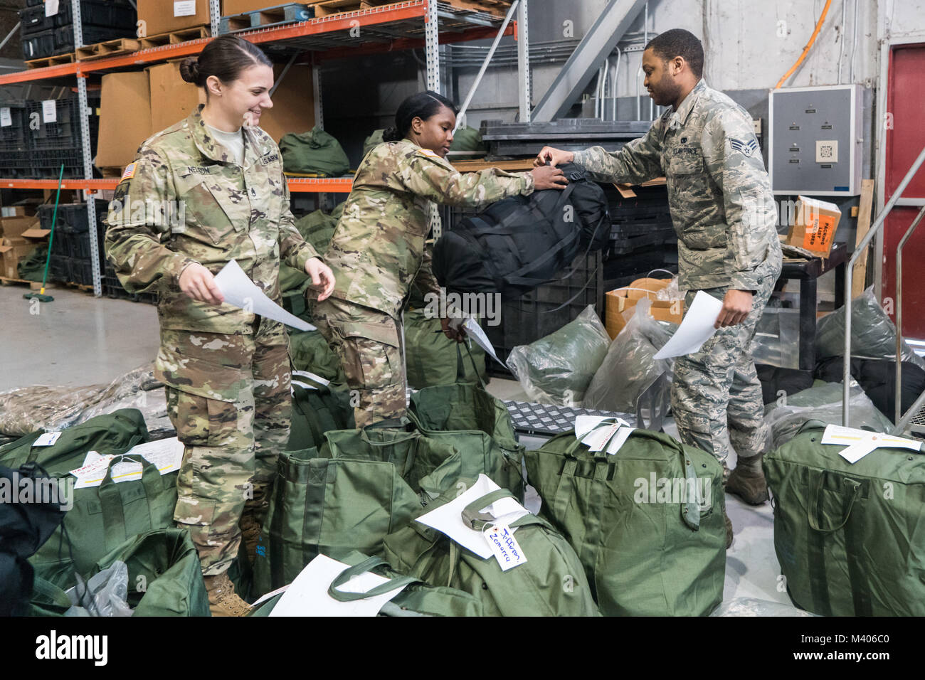 U.S. Air Force Senior Airman Jordan Harrigan, right, with the 461st Air ...