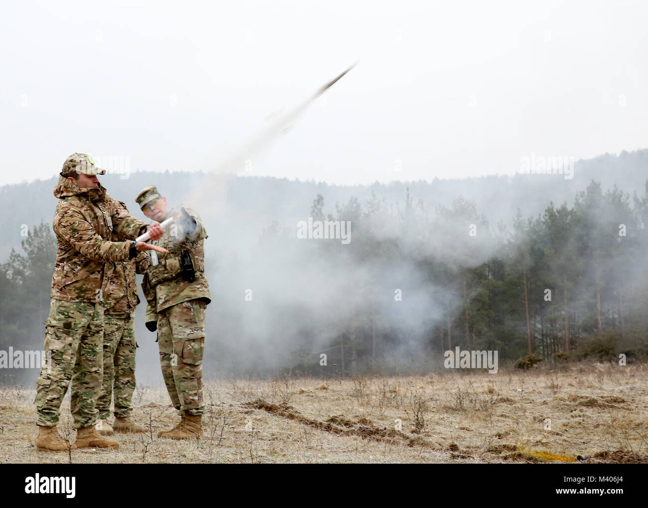 A U.S. Army observer coach/trainer (OC/T) instructs Georgian Army ...