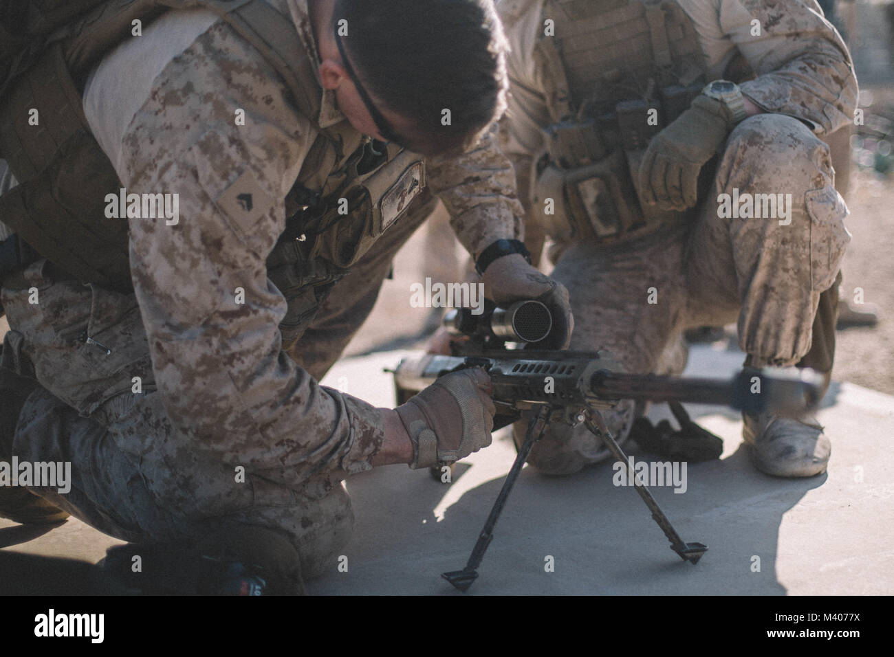 A U.S. Marine with Task Force Southwest prepares to fire the M107 ...