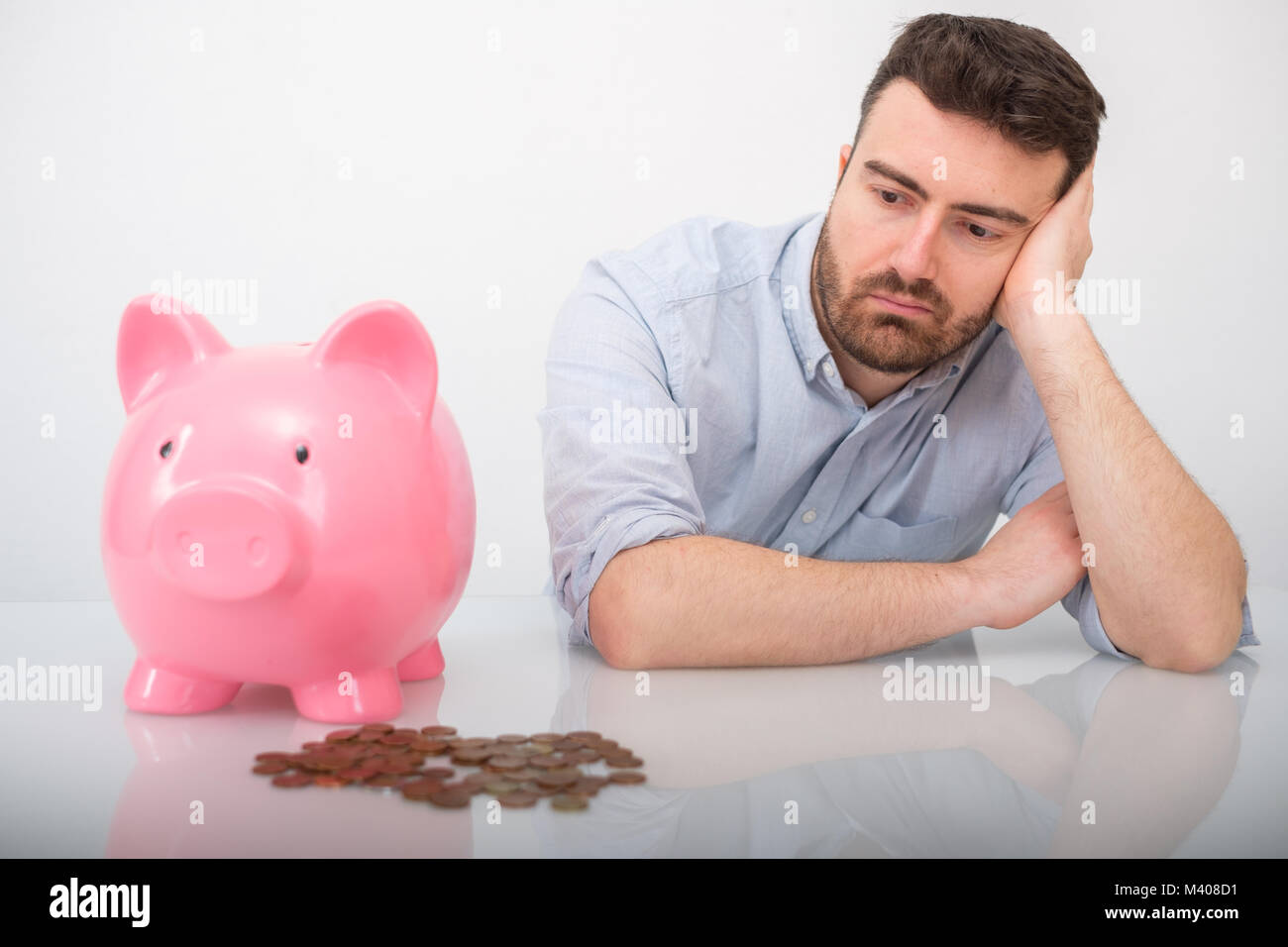 Sad man losing his savings after bad investment Stock Photo - Alamy