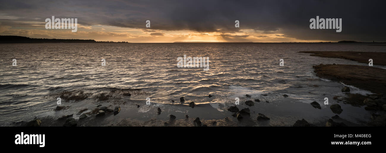 High tide sunset Stock Photo - Alamy