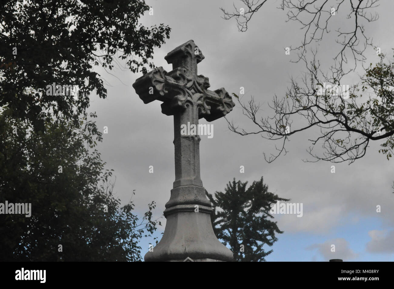 Cross Statue in a Cemetery Stock Photo - Alamy