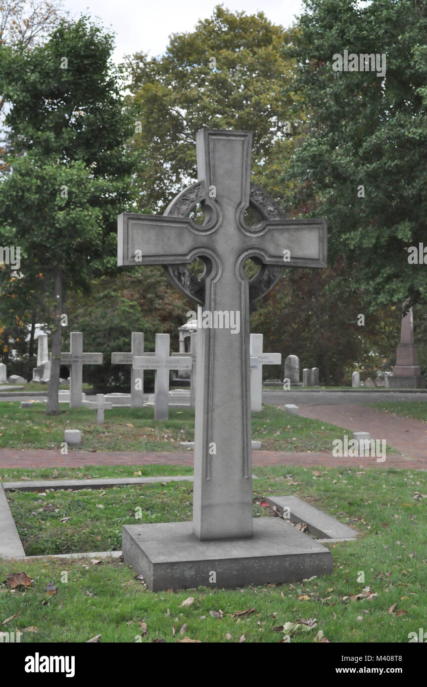 Cross Statue in a Cemetery Stock Photo - Alamy