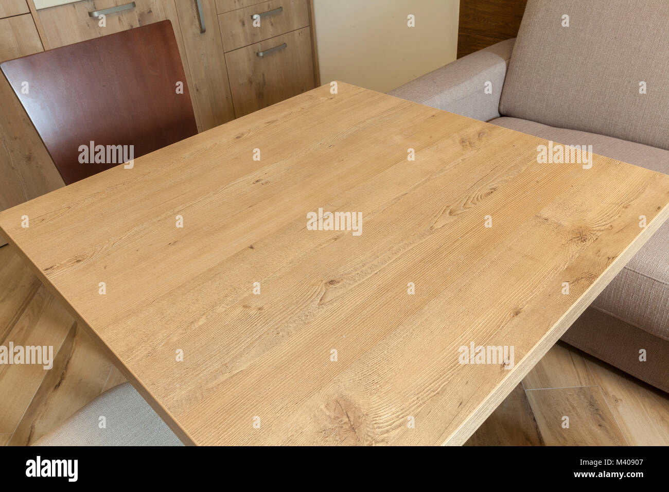 Wooden table in room hi-res stock photography and images - Alamy