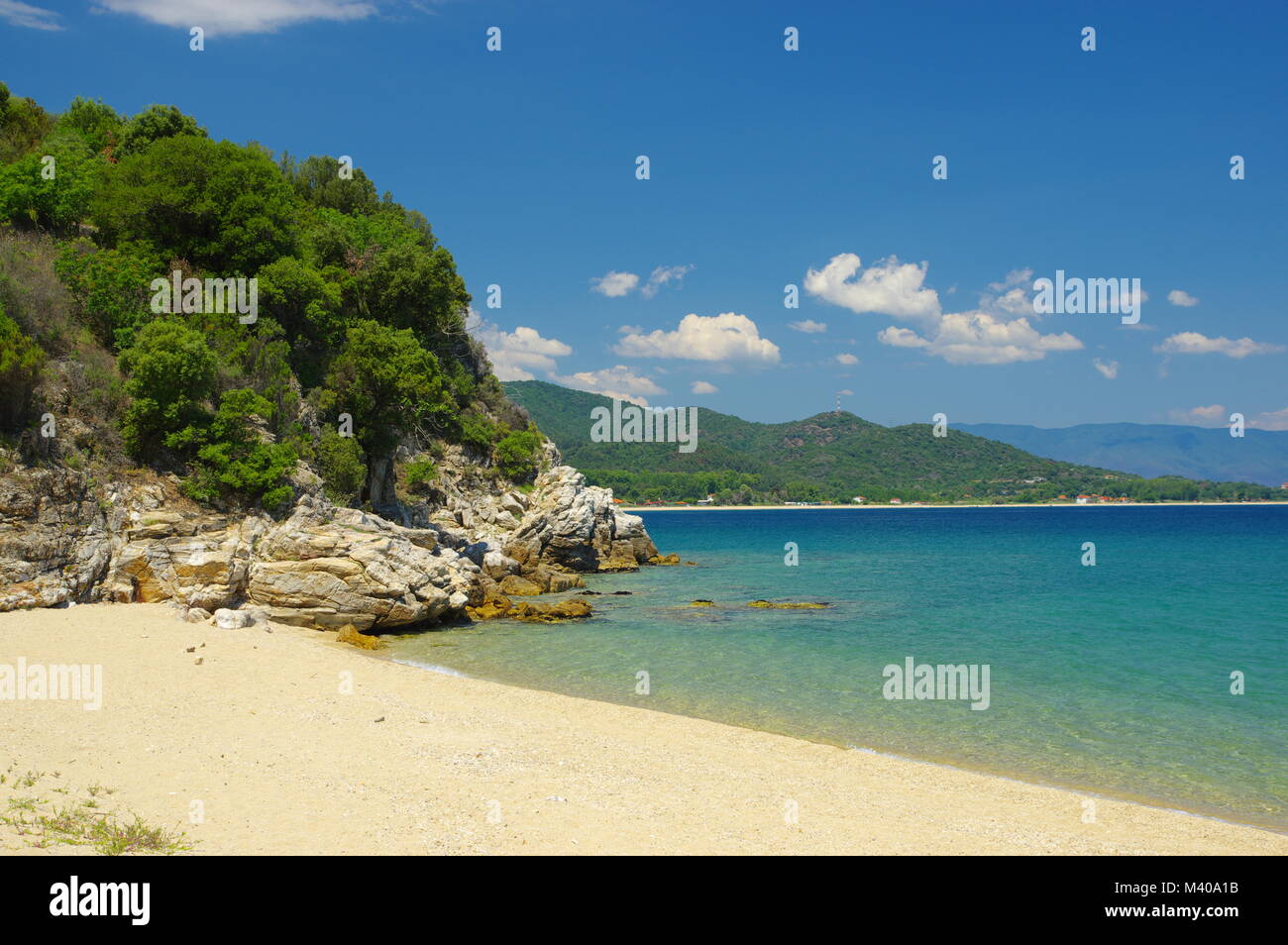 Sea coast near Stagria, Greece. The sandy beach ended with a cliff. A ...