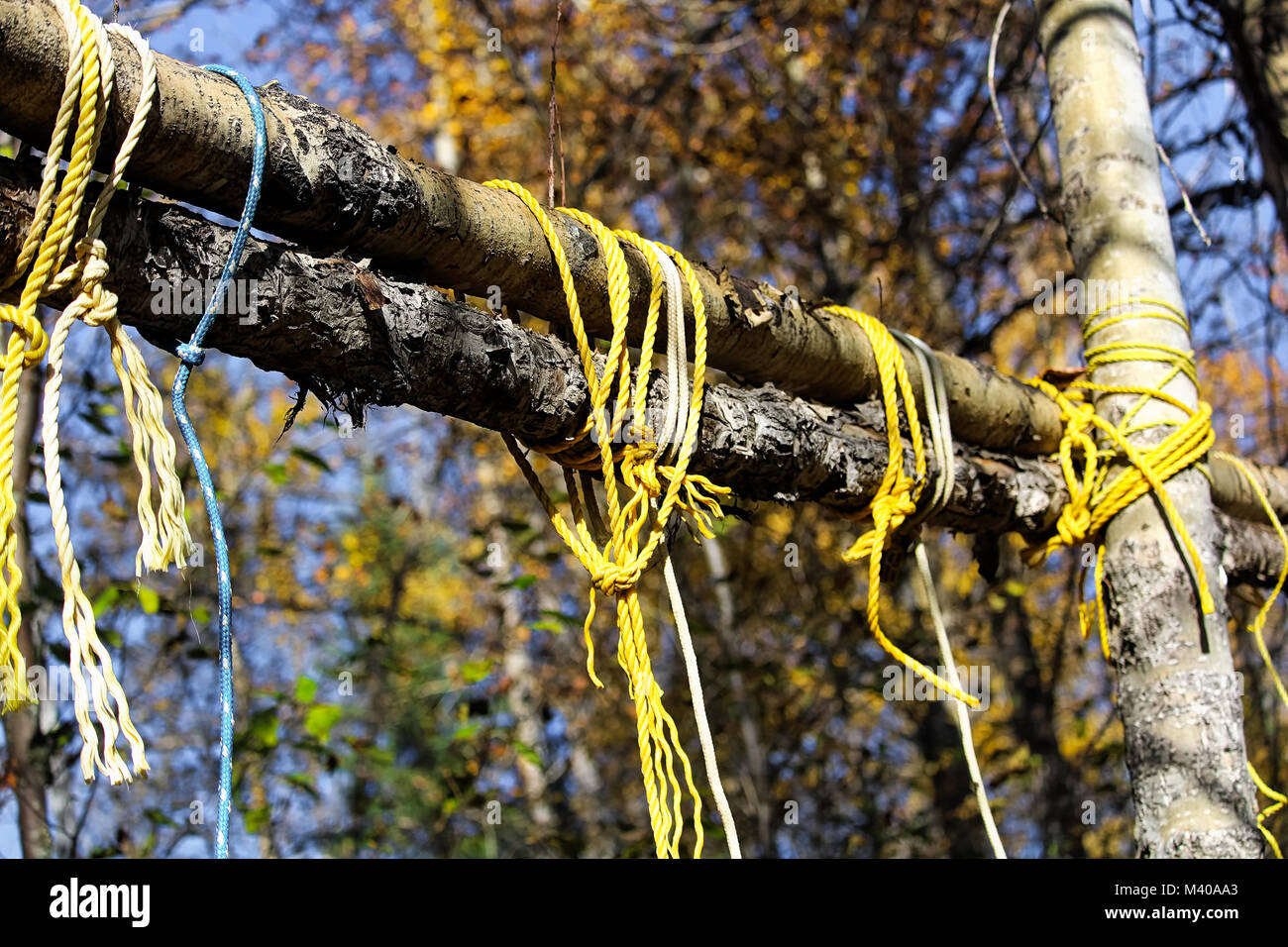 Various ropes left behind on game hanging poles Stock Photo - Alamy
