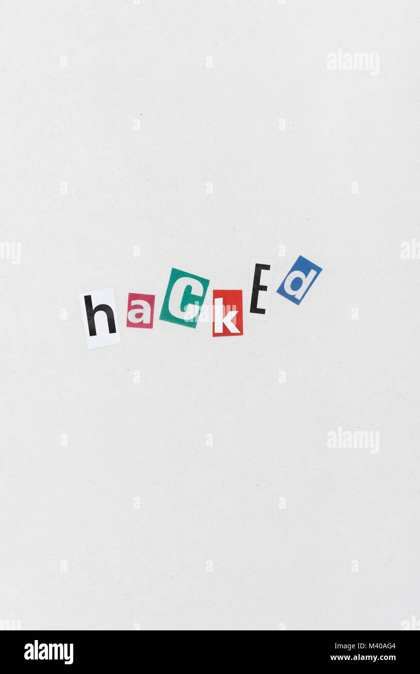 Hacked / Ransomware cutout letters message on sheet of plain newsprint ...