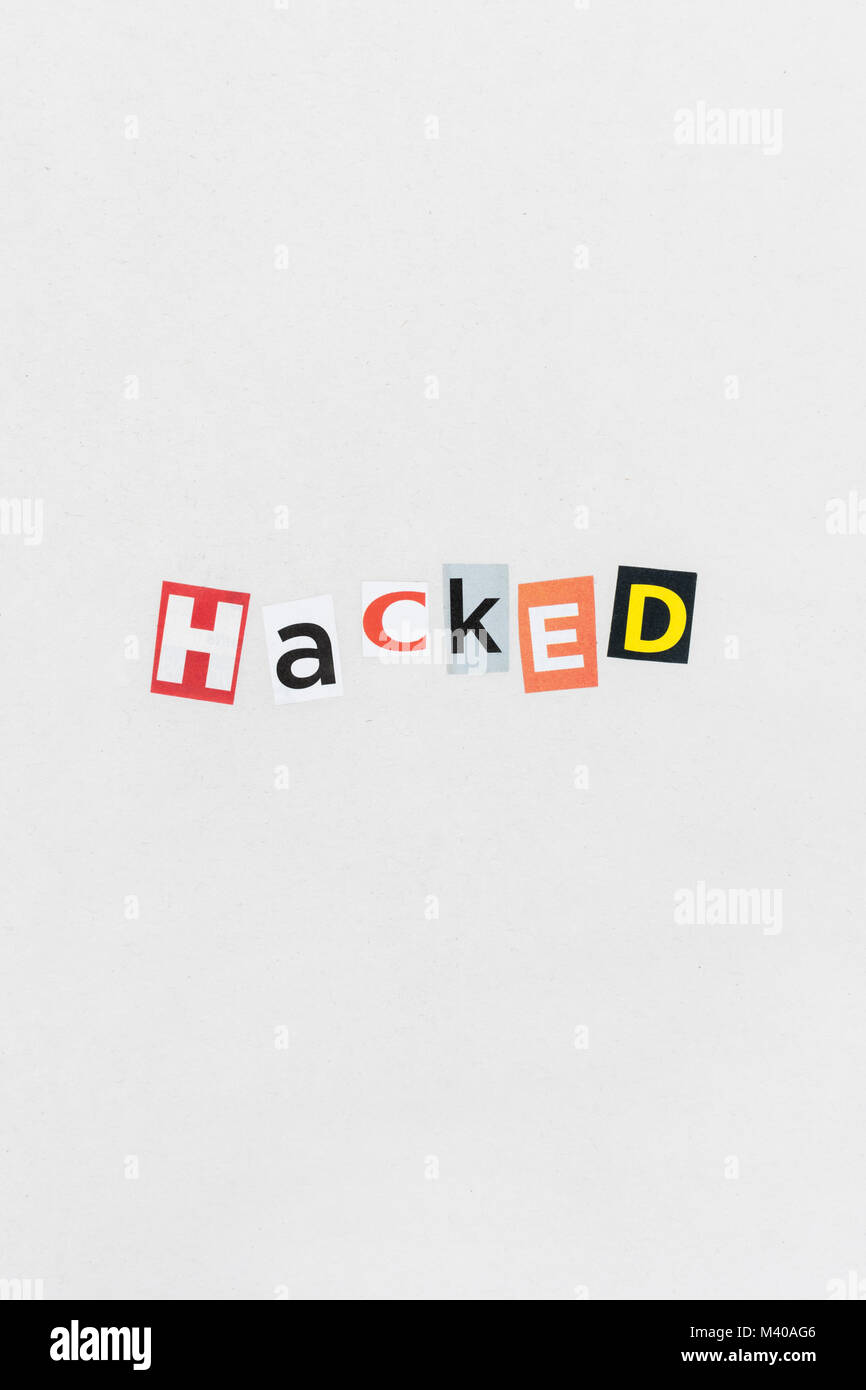 Hacked / Ransomware cutout letters message on sheet of plain newsprint ...