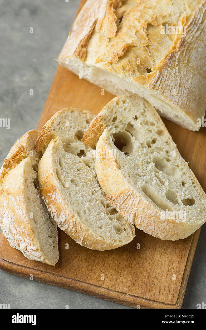 Top View of Sliced Artisanal Rustic Bread on Wooden Cutting Board Dark ...