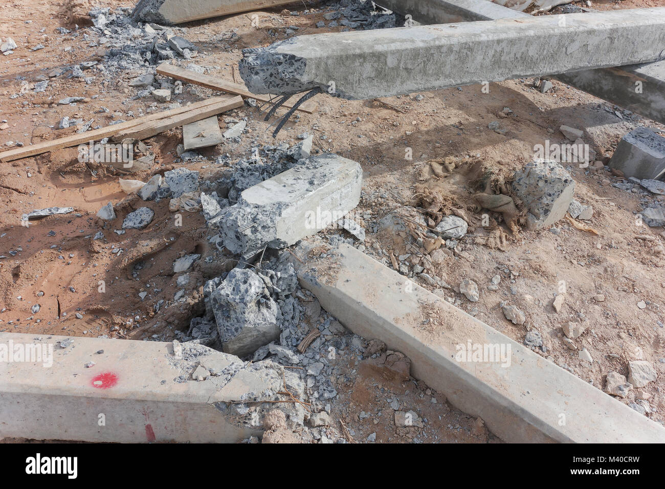 Damage pillar on ground at construction site Stock Photo - Alamy