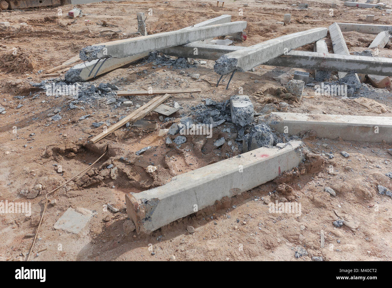 Damage pillar on ground at construction site Stock Photo - Alamy