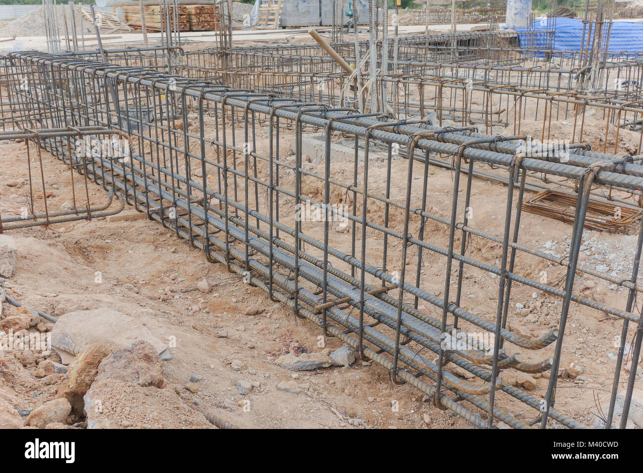 Steel tie of ground beam waiting for concrete work Stock Photo - Alamy
