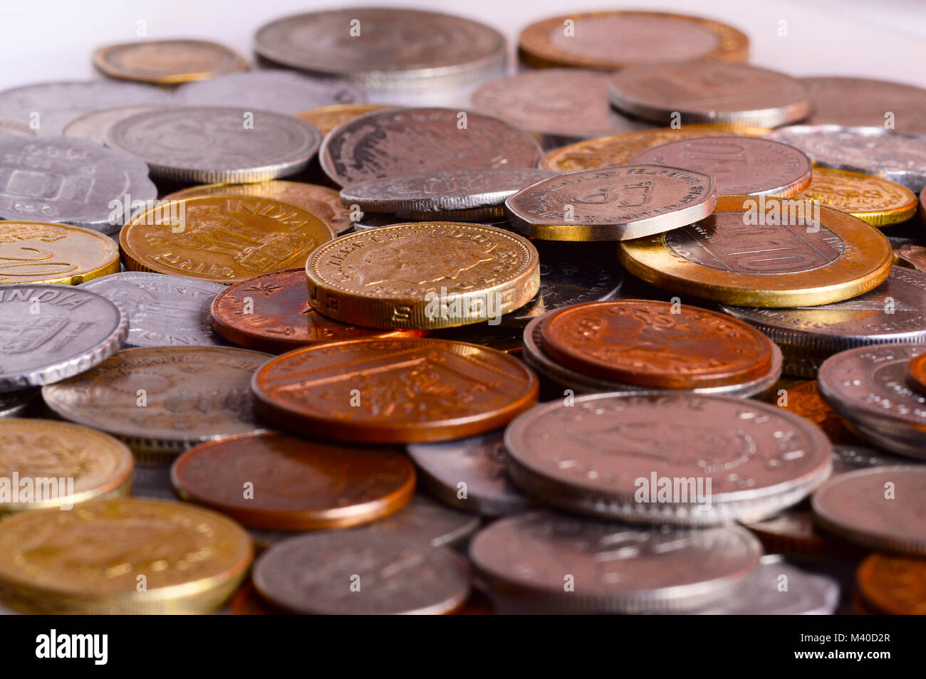Pile of foreign coins hi-res stock photography and images - Alamy