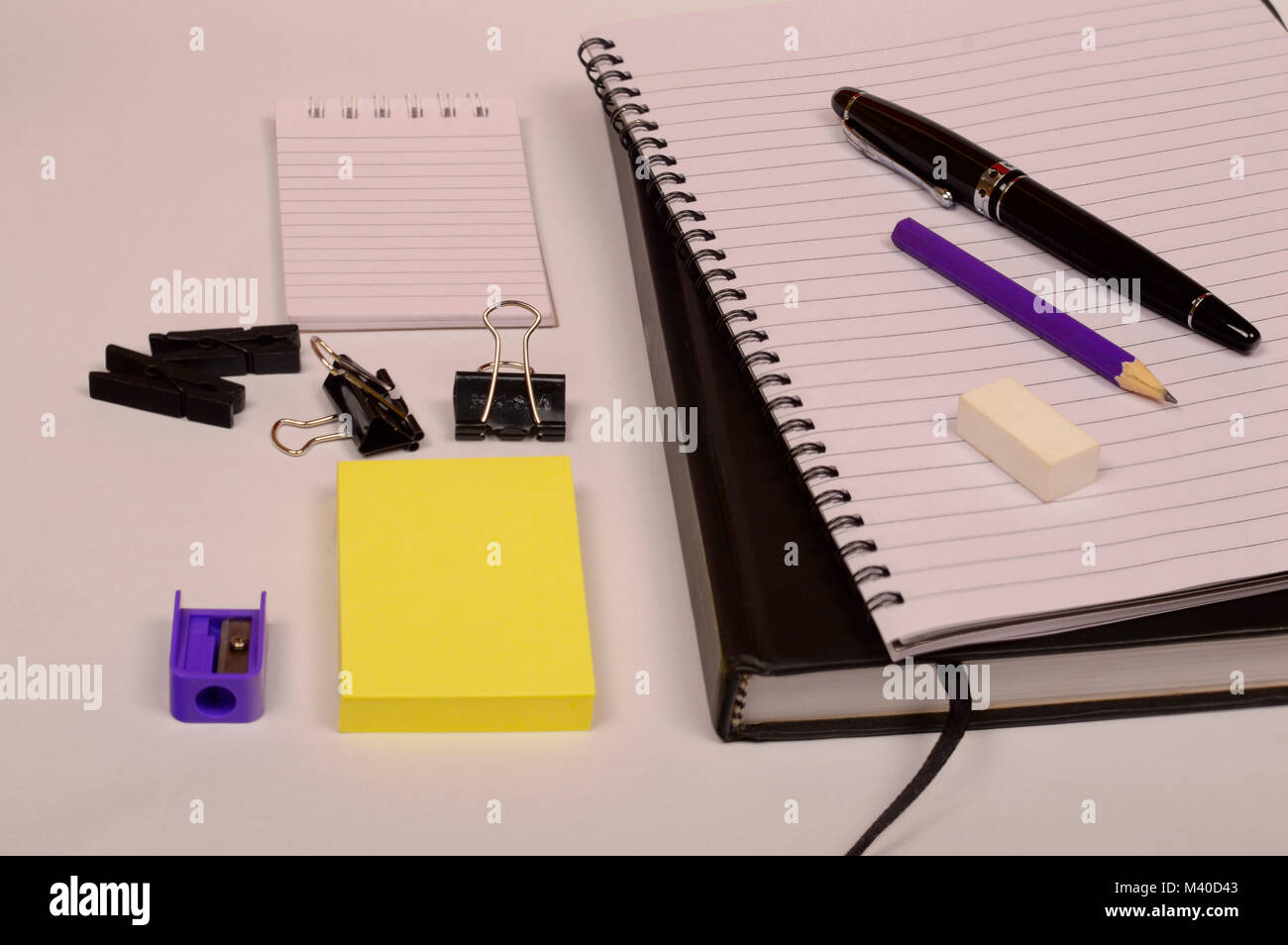 Office tools on white background Stock Photo - Alamy